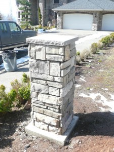 Stone driveway entry post